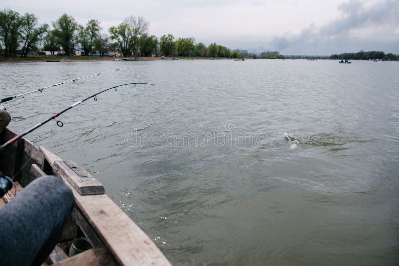 Fishermen Catch Fish Sitting in the Boat Stock Image - Image of catch ...
