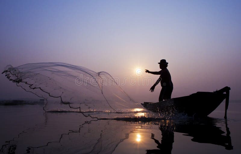 Fishermen are Catching Fish with a Cast Net. Stock Image - Image of ...
