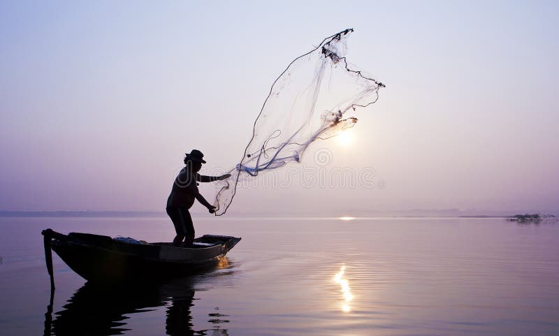 Fishermen are Catching Fish with a Cast Net. Stock Image - Image of ...