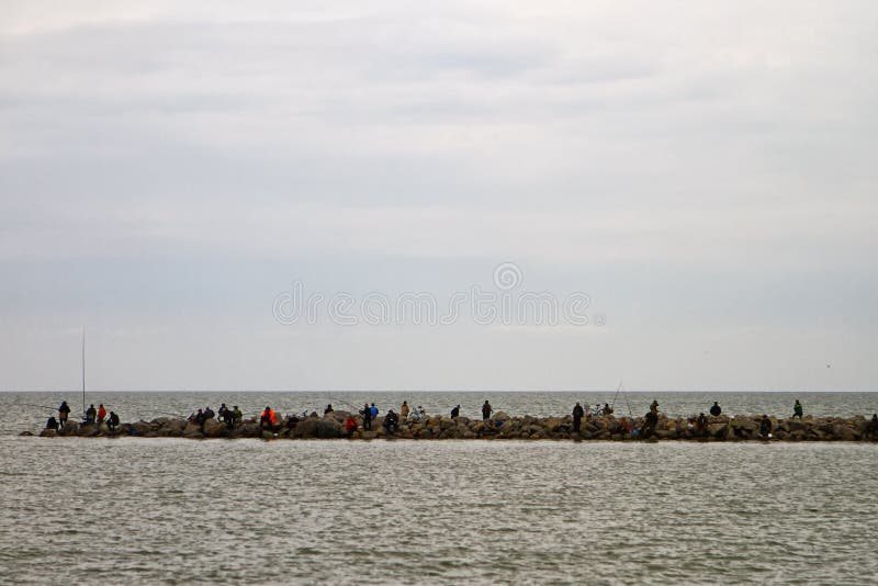 Fishermen on the Pier in Winter Stock Image - Image of fishing, invalid ...
