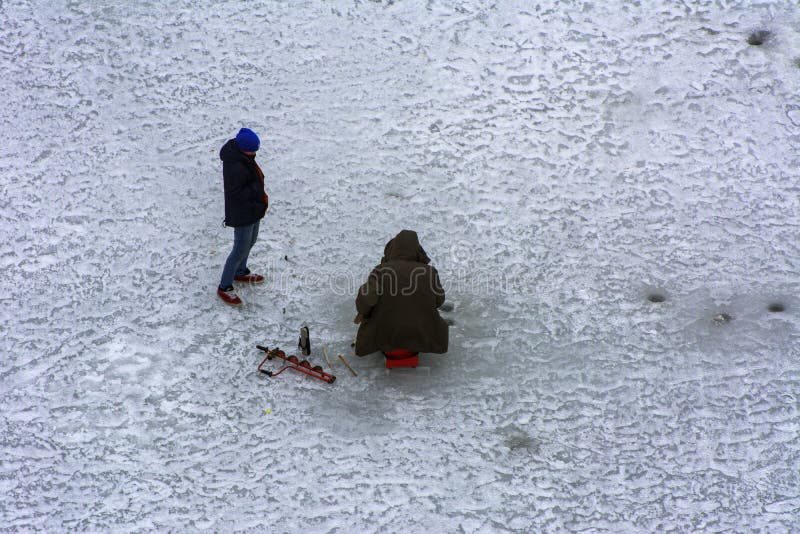 Fishermen on the River in Winter Ice Fishing before Editorial ...