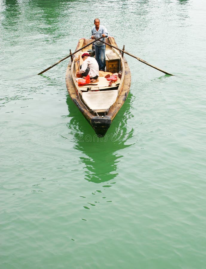 Fishermen Rowing in a Sampan Editorial Photography - Image of southeast ...
