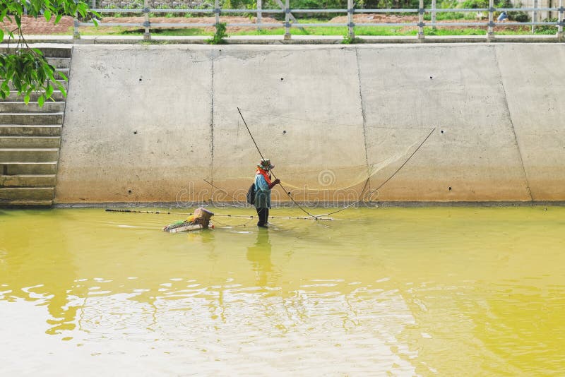 Fishermen Using Nets To Catch Fish Stock Image - Image of nature, boat ...