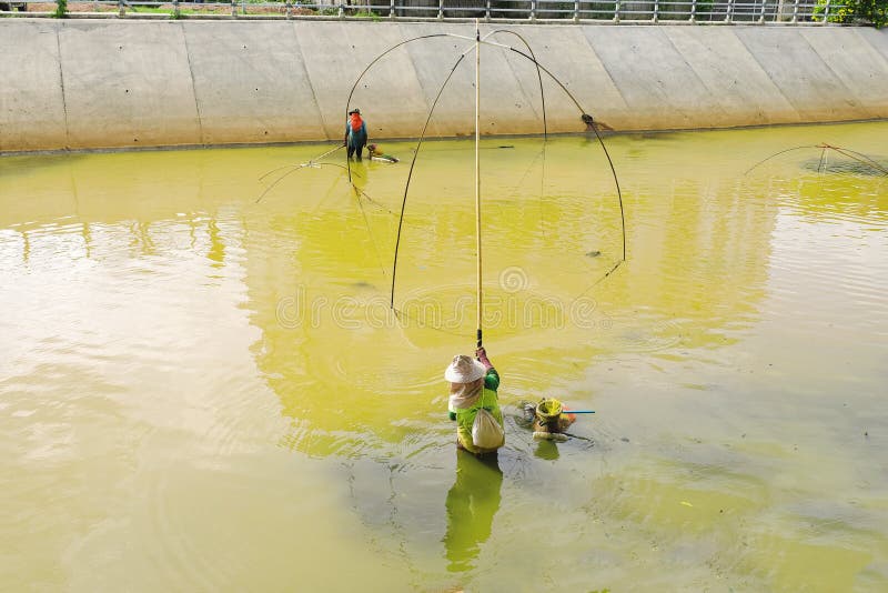 Fishermen Using Nets To Catch Fish Stock Image - Image of nature, boat ...