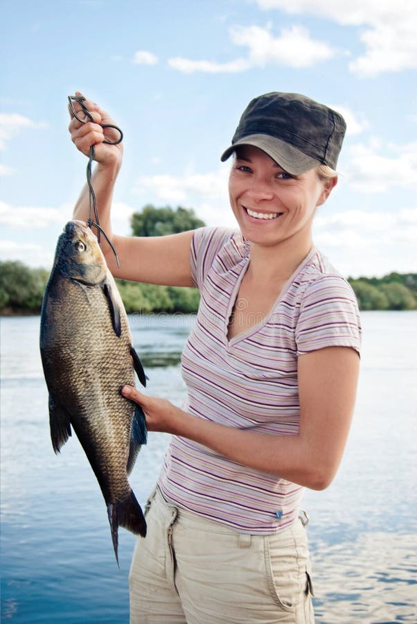 Lady Angler Fisherwoman Holds a Large Mouth Bass Caught Ice Fishing ...