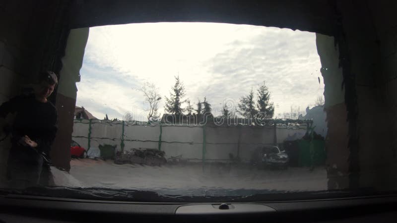View from Inside the Car through the Windshield while Washing with Foam ...