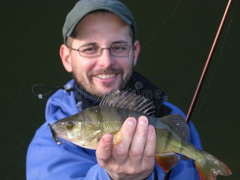 Man Fishing Large Mouth Bass Stock Photo - Image of fish, reel: 28295112
