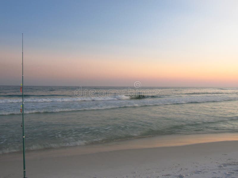 Fishing Along Destin Beach at Sunset Stock Photo - Image of shore ...