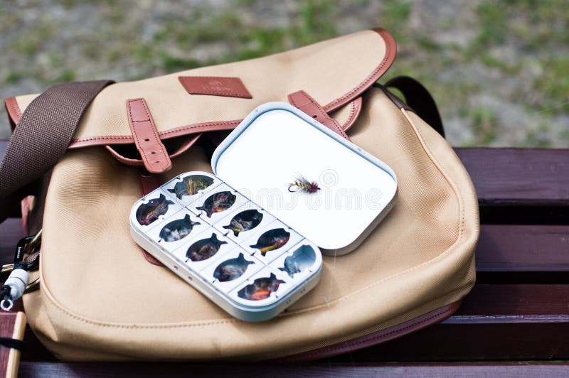 A Fishing Bag and a Dry Fly Box Stock Photo - Image of alps, fishing ...