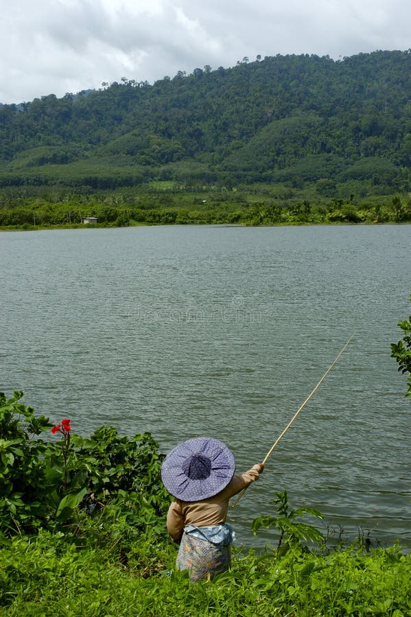 Fishing with Bamboo Rod at Private Lake Stock Photo - Image of woman ...