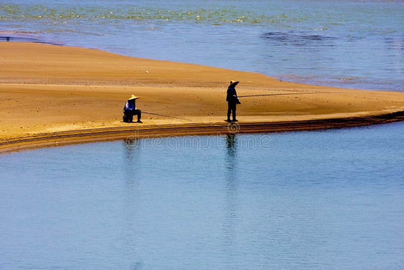 Fishing on beach stock image. Image of freshwater, angler - 19755231