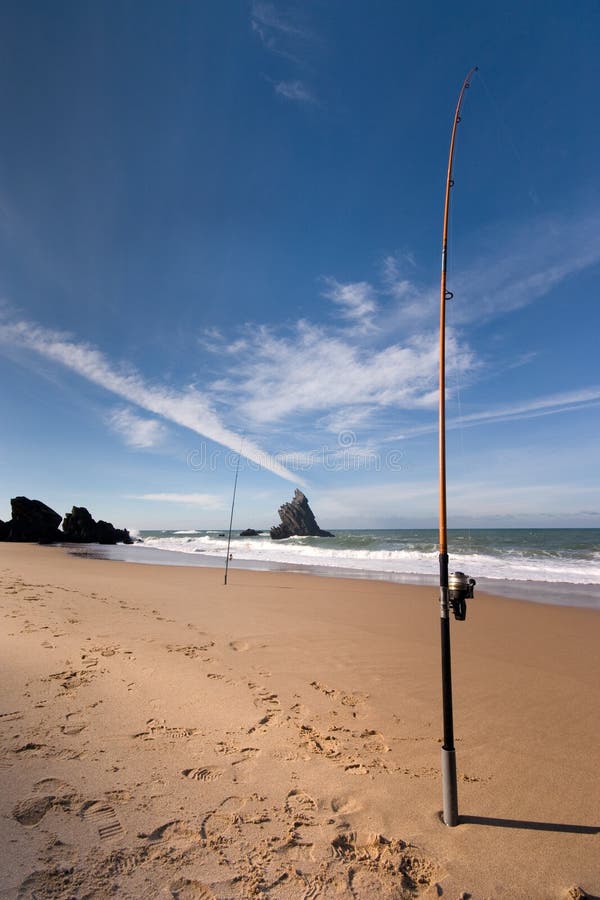 Fishing at the beach stock image. Image of male, beach - 6381741
