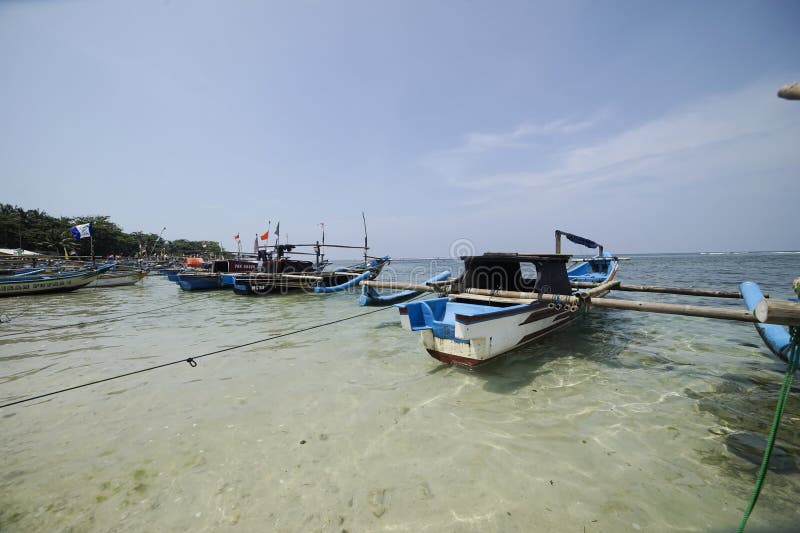 Fishing Boat Anchored on the Beach Stock Image - Image of ikan, ocean ...
