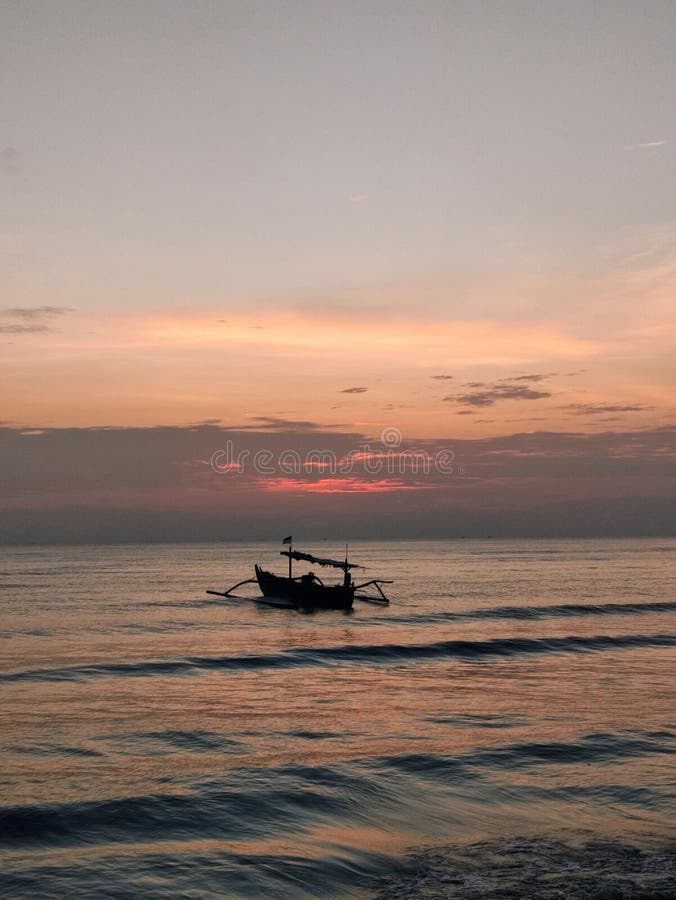 A Fishing Boat Anchored on the North Coast of Java, Indonesia with a ...