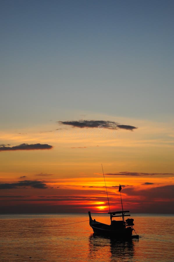 Fishing Boat at Beach and Sunset Stock Image - Image of blue, holy ...