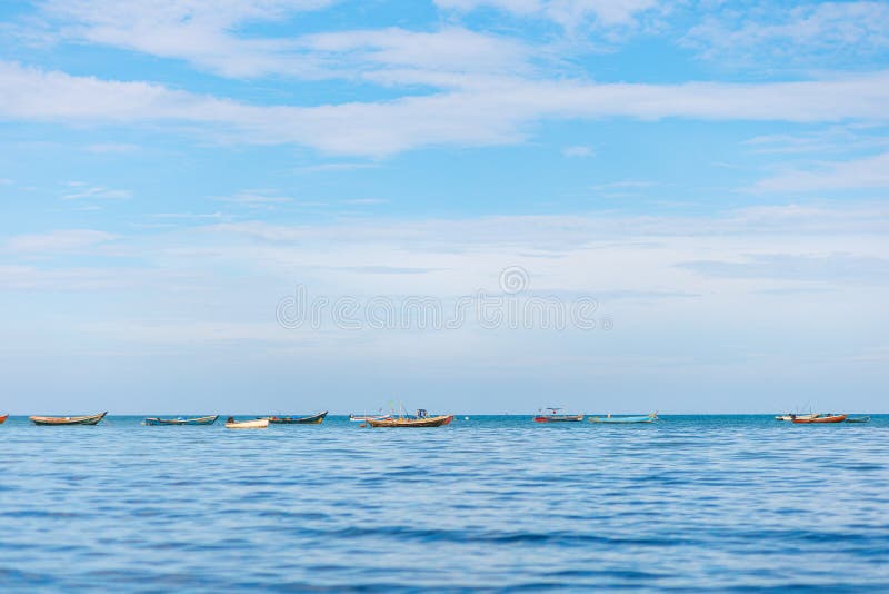 Fishing Boat on the Blue Water and Blue Sky Stock Photo - Image of boat ...