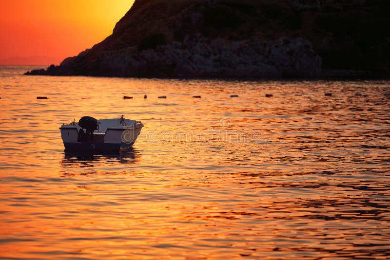 Fishing boat and sunset stock photo. Image of romantic - 126091862