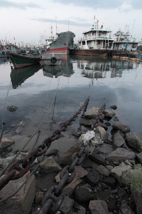 Fishing boat dock stock photo. Image of buildings, green - 185077070