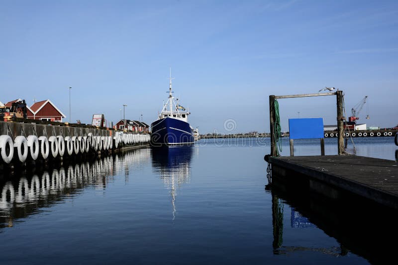 Fishing boat at the harbor stock photo. Image of deep - 52673506