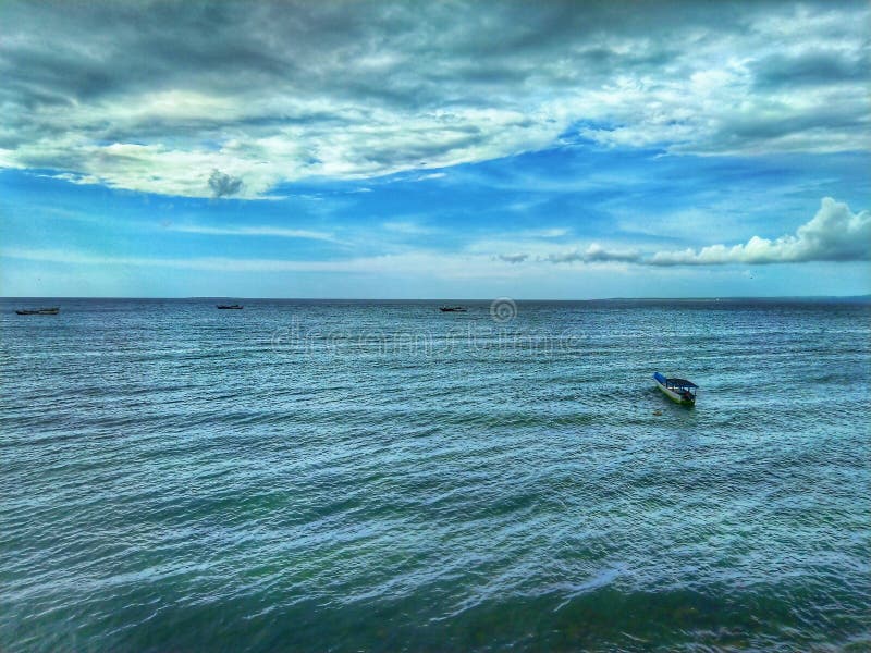 Fishing Boat Hit by Sea Waves with a Cloudy Sky Stock Image - Image of ...