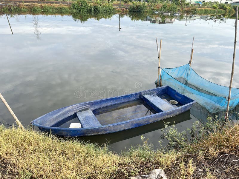Fishing boat on the lake stock photo. Image of ocean - 328660182