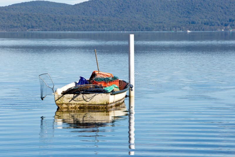 Fishing Boat on Lake with Reflection in Water Stock Image - Image of ...