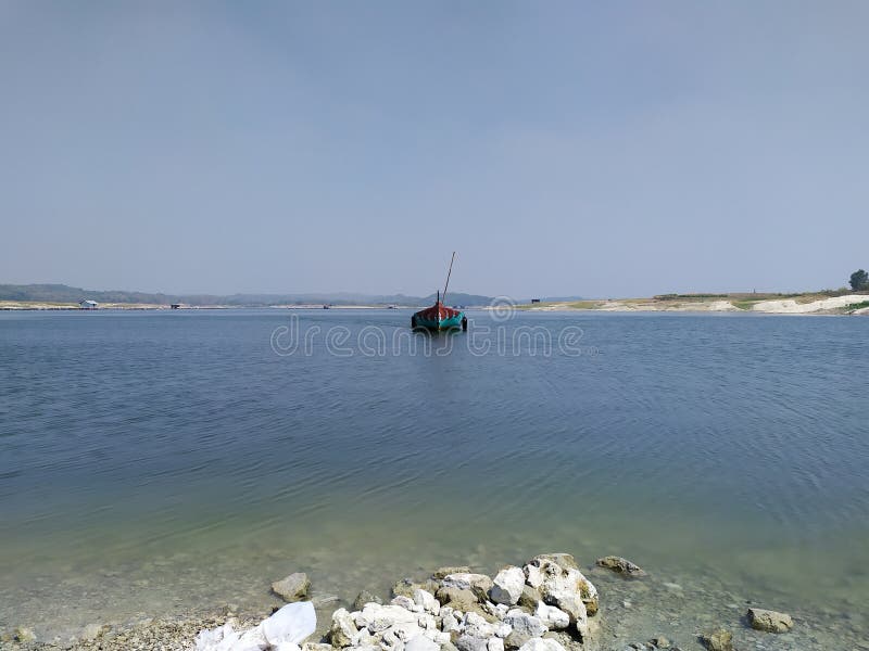 Fishing Boat in the Middle of the Lake Stock Photo - Image of water ...