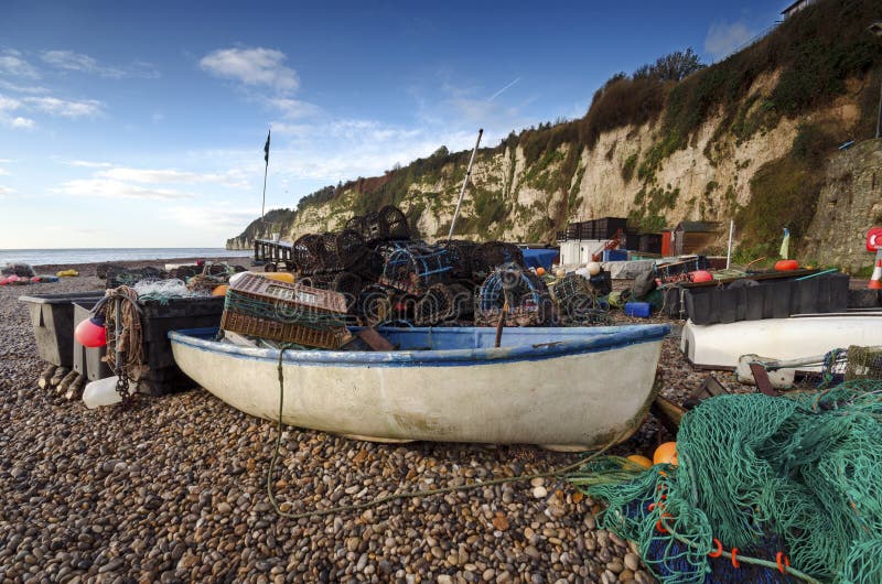 Fishing Boat and Nets on the Beach in Devon Stock Photo - Image of buoy ...