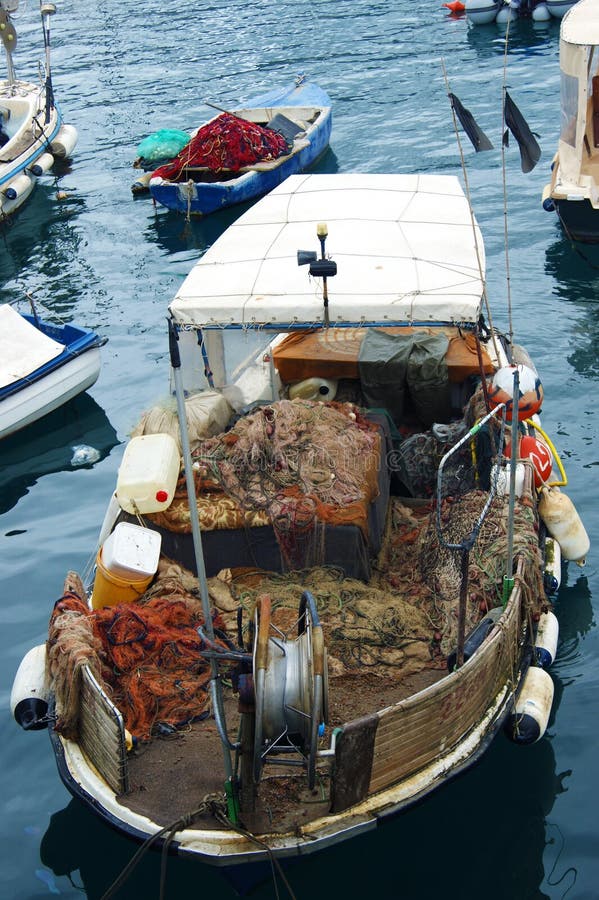 Fishing boat with nets stock photo. Image of naval, harbour - 71771470