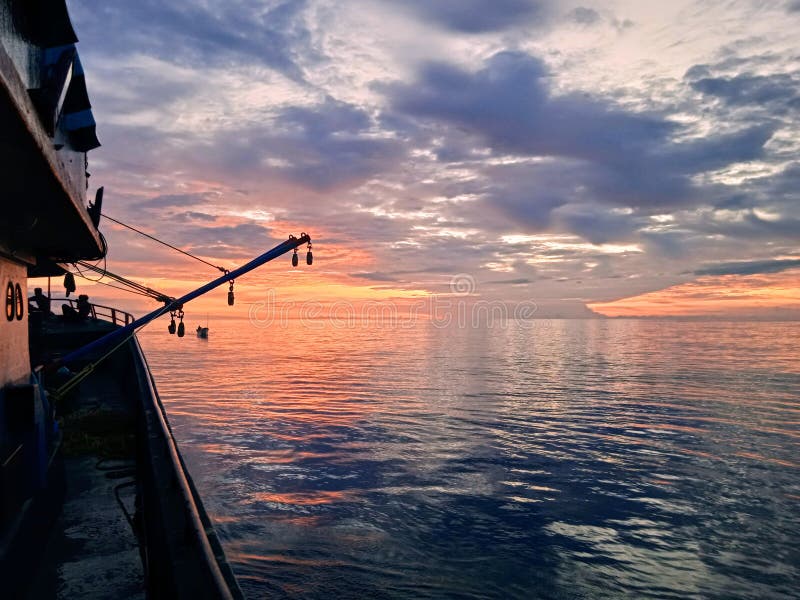 Fishing Boat Resting in the Middle of the Sea Stock Photo - Image of ...