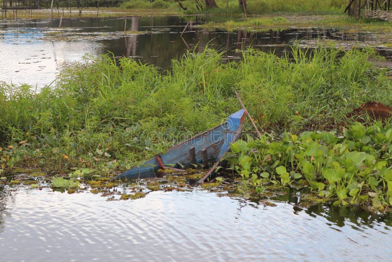 Fishing Boat that Sank on the Lake Stock Image - Image of pond, marsh ...