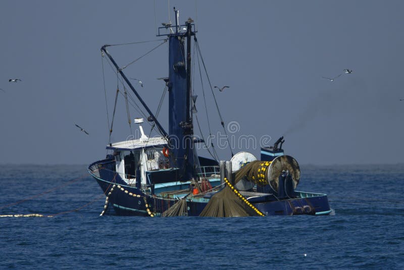 Fishing Boat at Sea stock photo. Image of boat, storm - 7259916