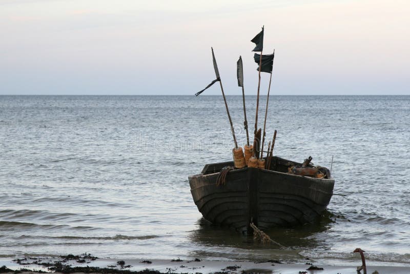 Old Boat on the seacoast stock photo. Image of harbour - 106495290