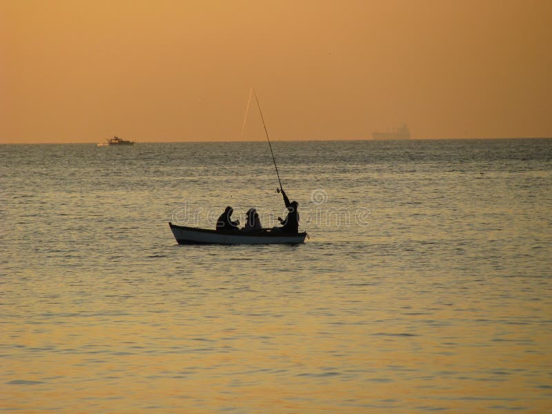 Fishing Boat at Sunset stock image. Image of landscape - 4023025
