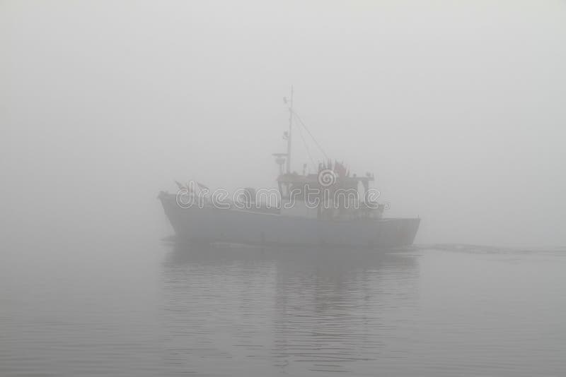 Fishing boat in thick fog stock photo. Image of booms - 62162914
