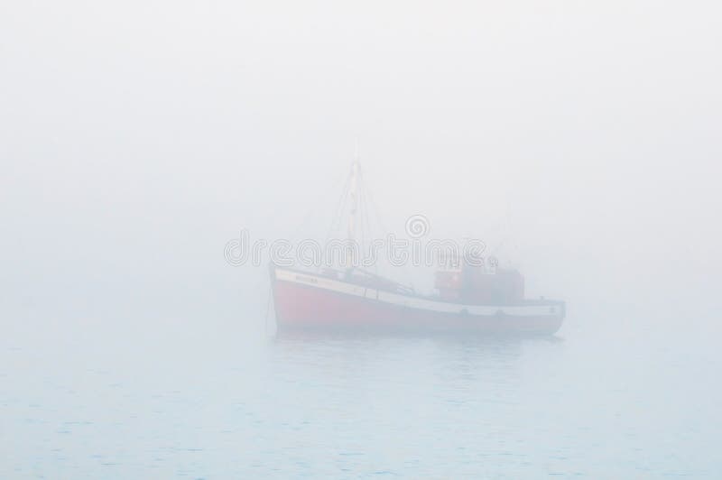Fishing boat in thick mist editorial photography. Image of thick - 56891847