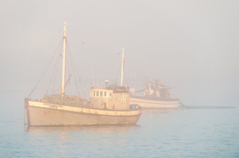 Fishing boat in thick mist editorial photography. Image of water - 56806167