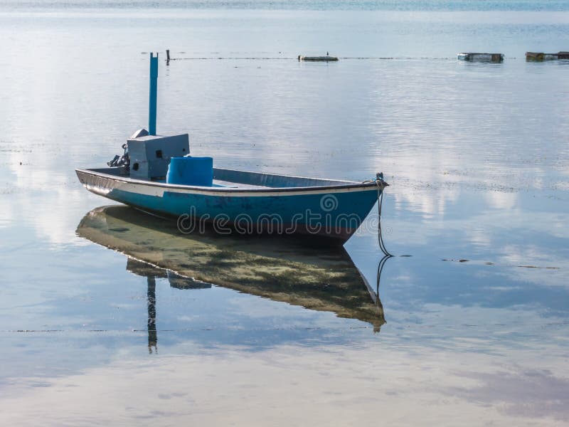Fishing Boat in the Water with Reflection Stock Image - Image of white ...