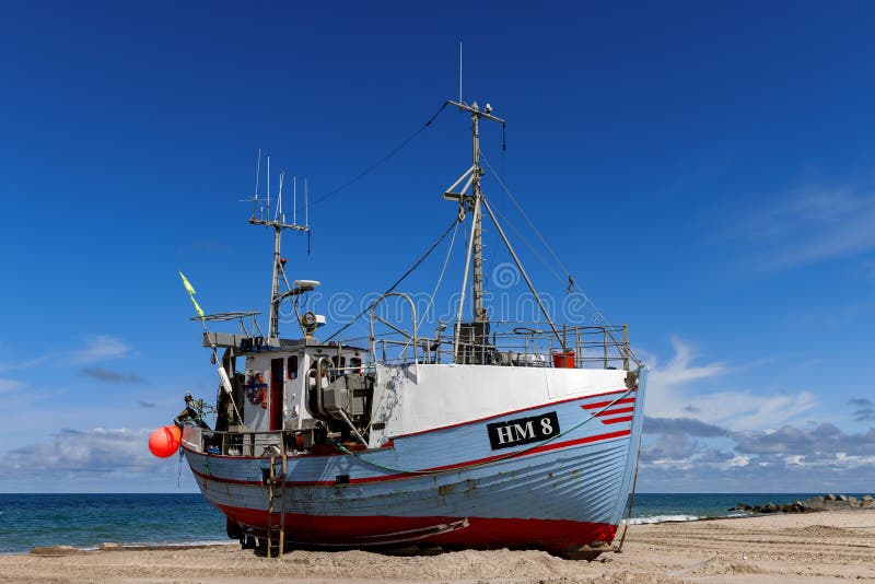 Fishing boats on the beach editorial stock photo. Image of scandinavia ...