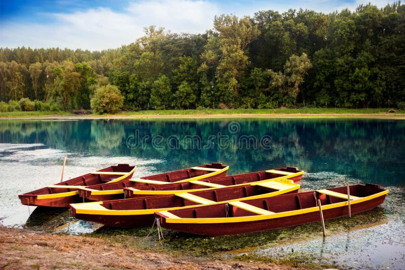 Fishing Boats in the Dock of the River Stock Photo - Image of calm ...