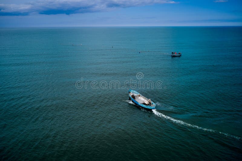 Fishing Boats Floating on the Sea Editorial Photo - Image of wooden ...
