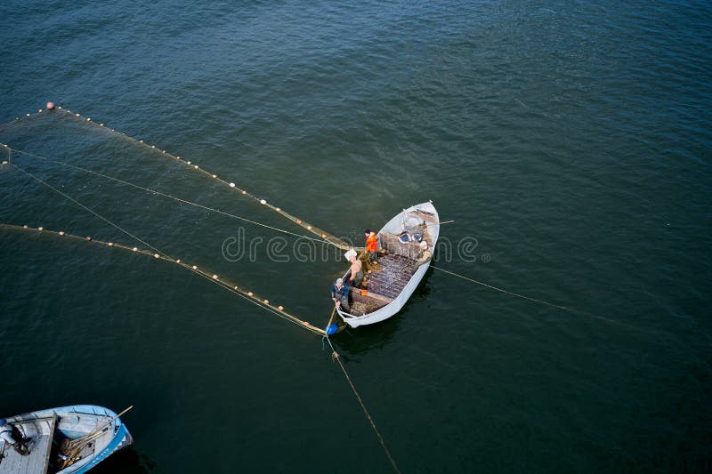 Fishing Boats Floating on the Sea Editorial Photo - Image of sunny ...