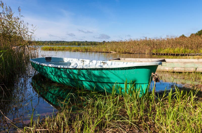Fishing boats at the lake stock image. Image of nature - 51076501