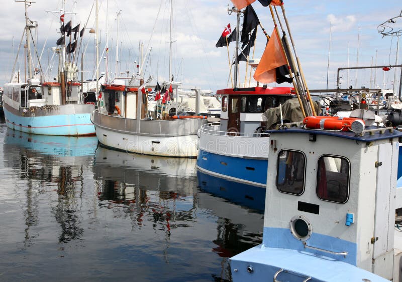 Fishing boats in a port stock photo. Image of anchor - 97998280