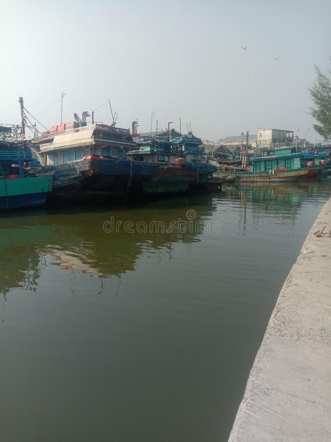 Fishing Boats in the Port of Tegal, Central Java Stock Image - Image of ...
