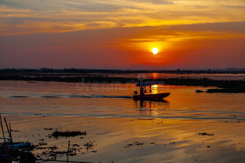 Fishing Boats in the Shadows Sunset Background Stock Image - Image of ...