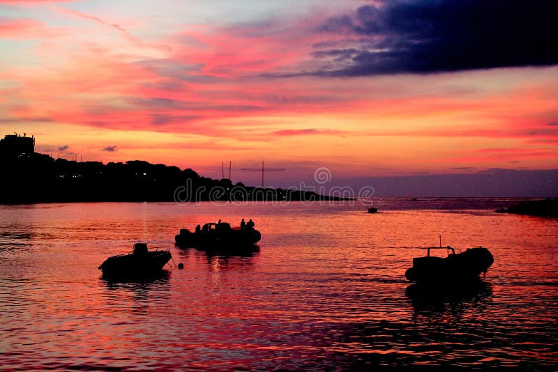 Fishing Boats at Sunset in Port Stock Photo - Image of draft, outboard ...