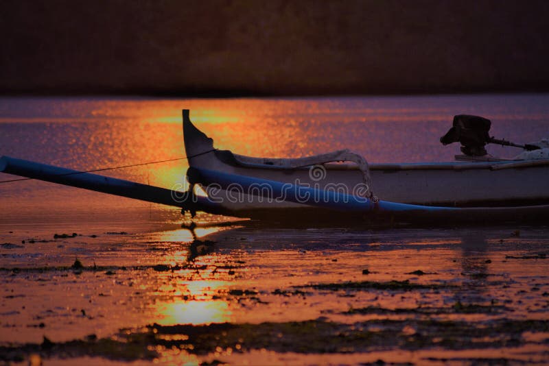 Sunset Shadows Cast from Beach Huts Towards Shore and Beautiful Sky ...