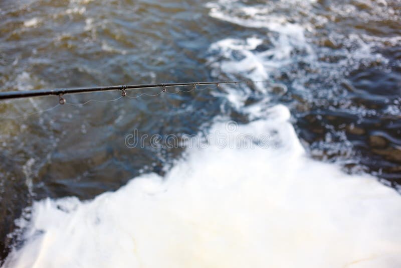 Fishing in bubbling water stock photo. Image of equipment - 38093374