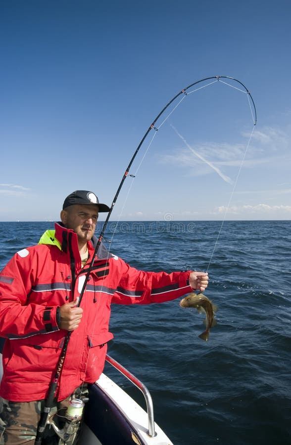 Fishing for cods stock photo. Image of sports, blue, horizon - 6151974